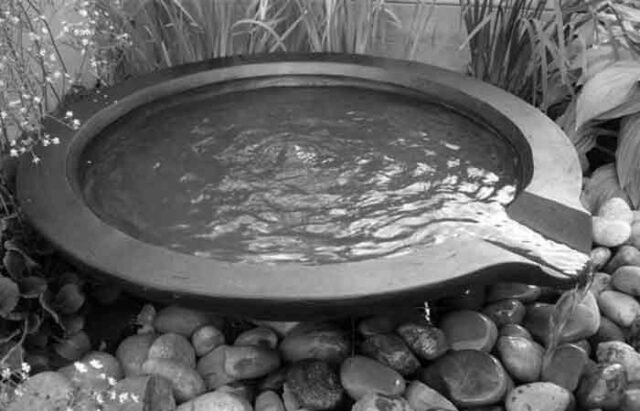 Rain Chain Drainage Ideas: Basins, Barrels, French Drains & More ...